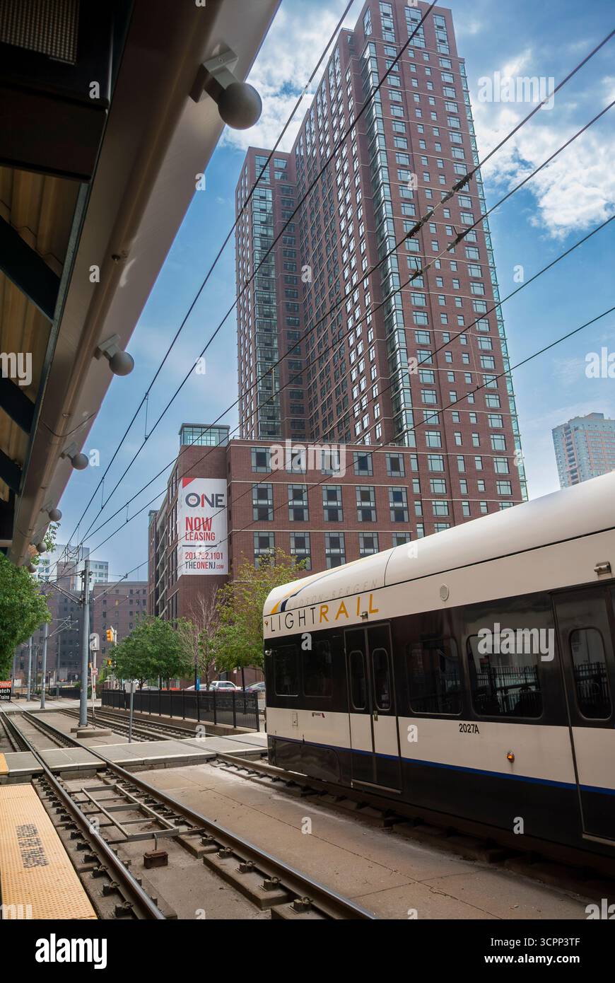 Train tramway modern buildings hi-res stock photography and images - Alamy