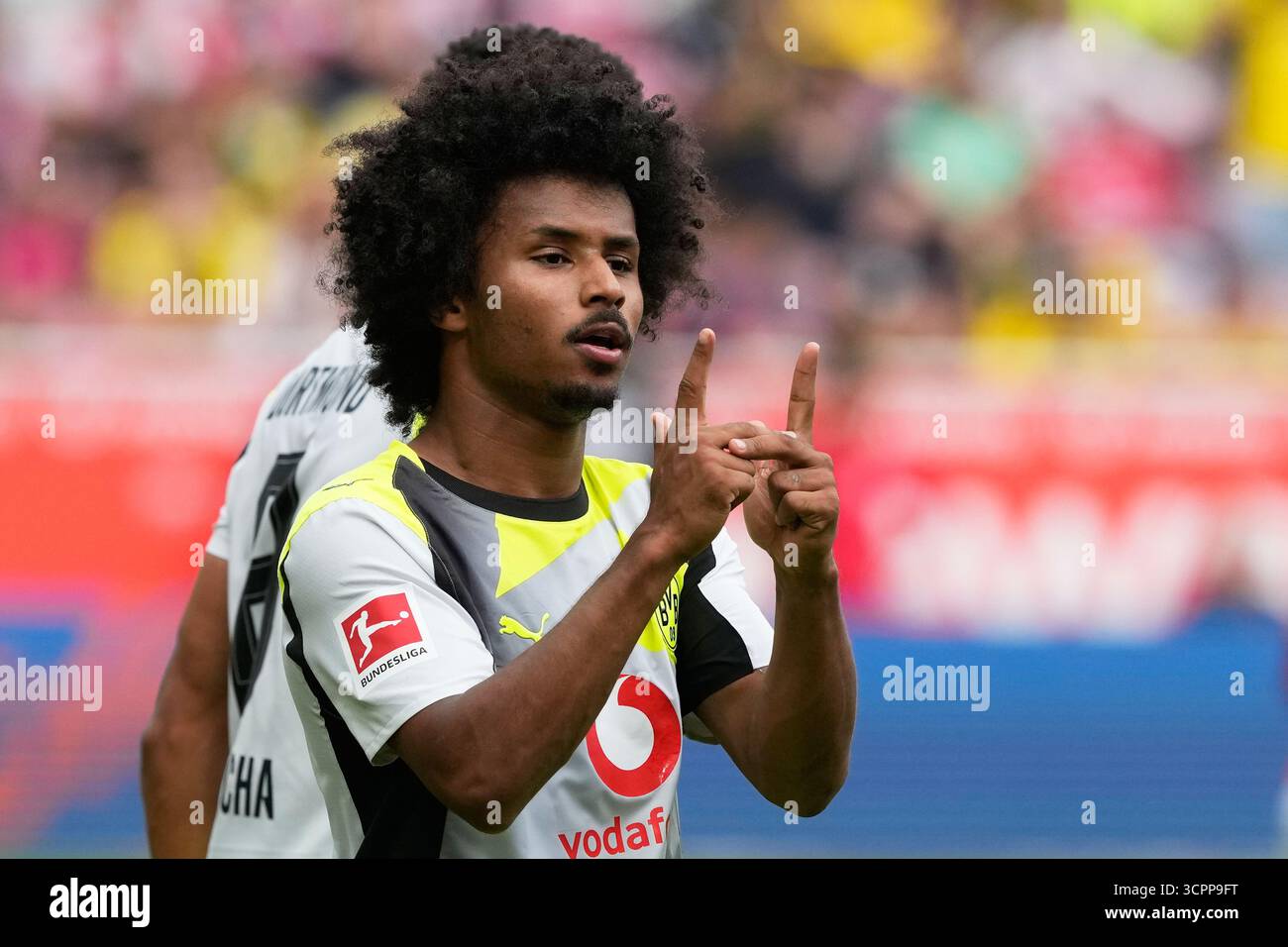 Dortmund's Karim Adeyemi celebrates after scoring the second goal ...