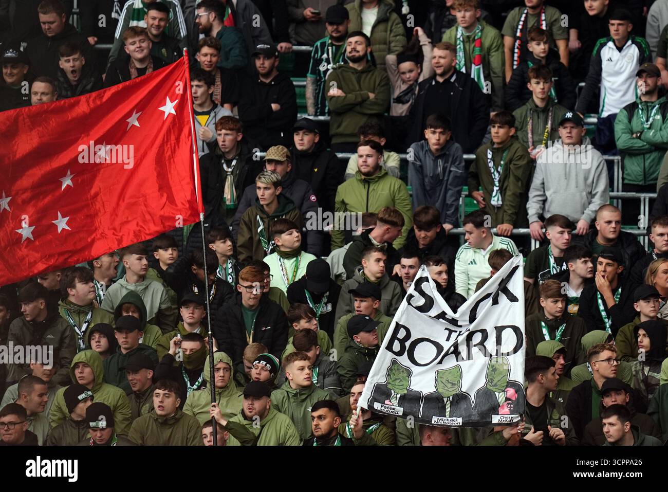 Celtic fans with protest banners in the stands against the board during ...