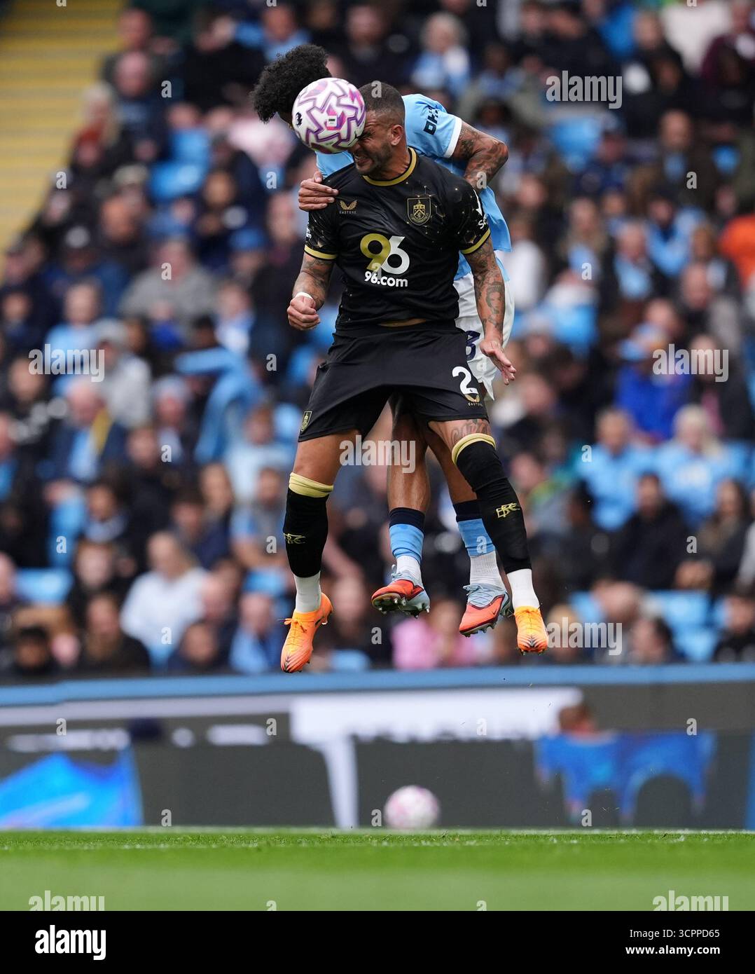Burnley's Kyle Walker and Manchester City's Nico O'Reilly battle for ...