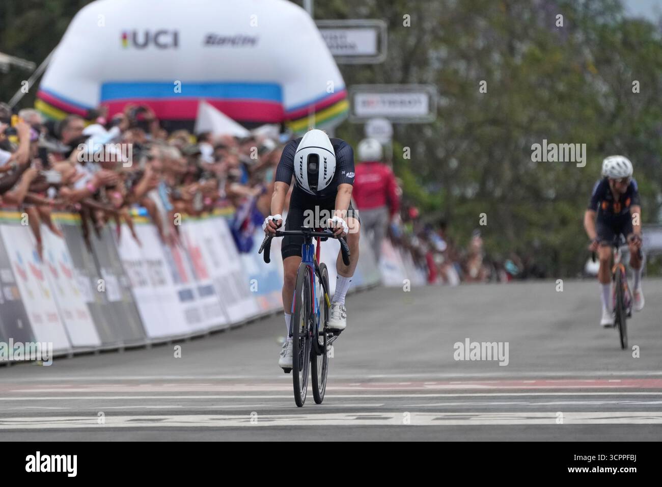 New Zealand's Niamh Fisher-Black crosses the finish line to win the silver medal of the women's ...