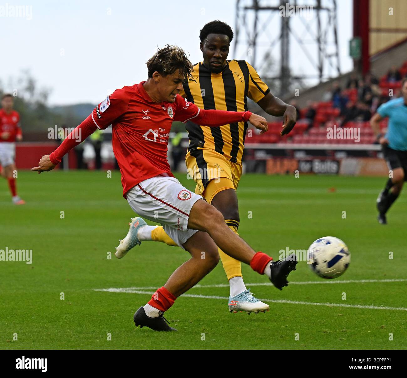 Barnsley's Caylan Vickers crosses the ball in the match between ...