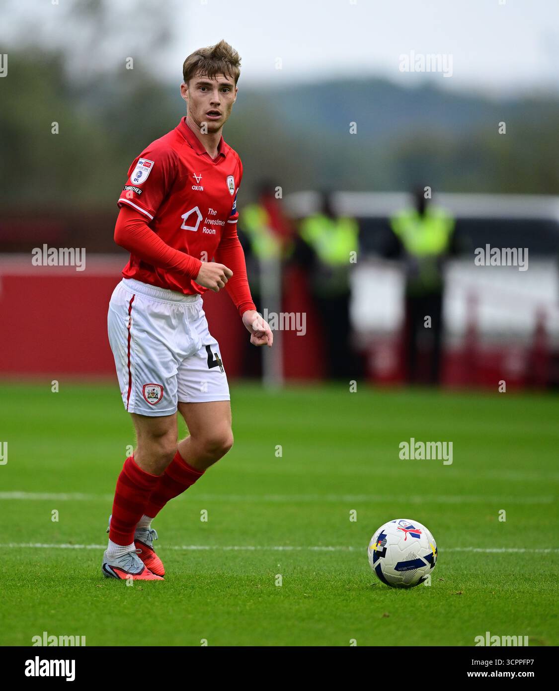 Barnsley's Luca Connell looks to play the ball forward in the match ...