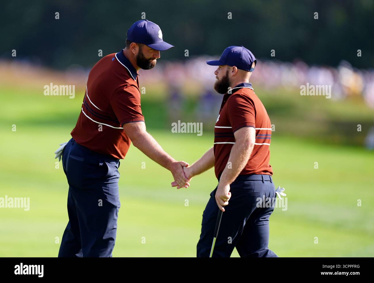 Jon Rahm and Tyrrell Hatton of Team Europe during the morning foursomes ...