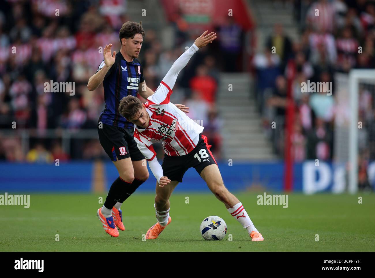 Southampton's Tom Fellows battles for the ball with Middlesbrough's ...