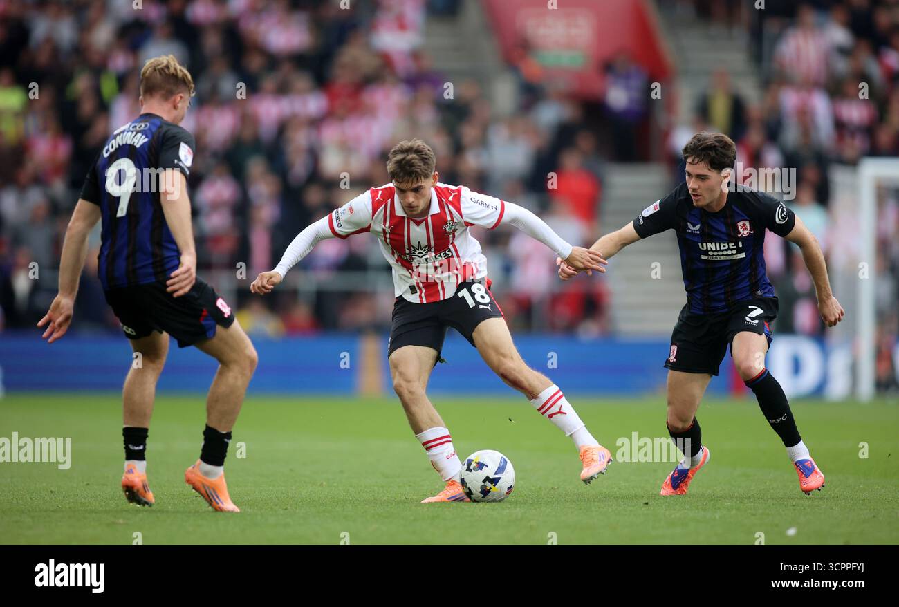 Southampton's Tom Fellows battles for the ball with Middlesbrough's ...