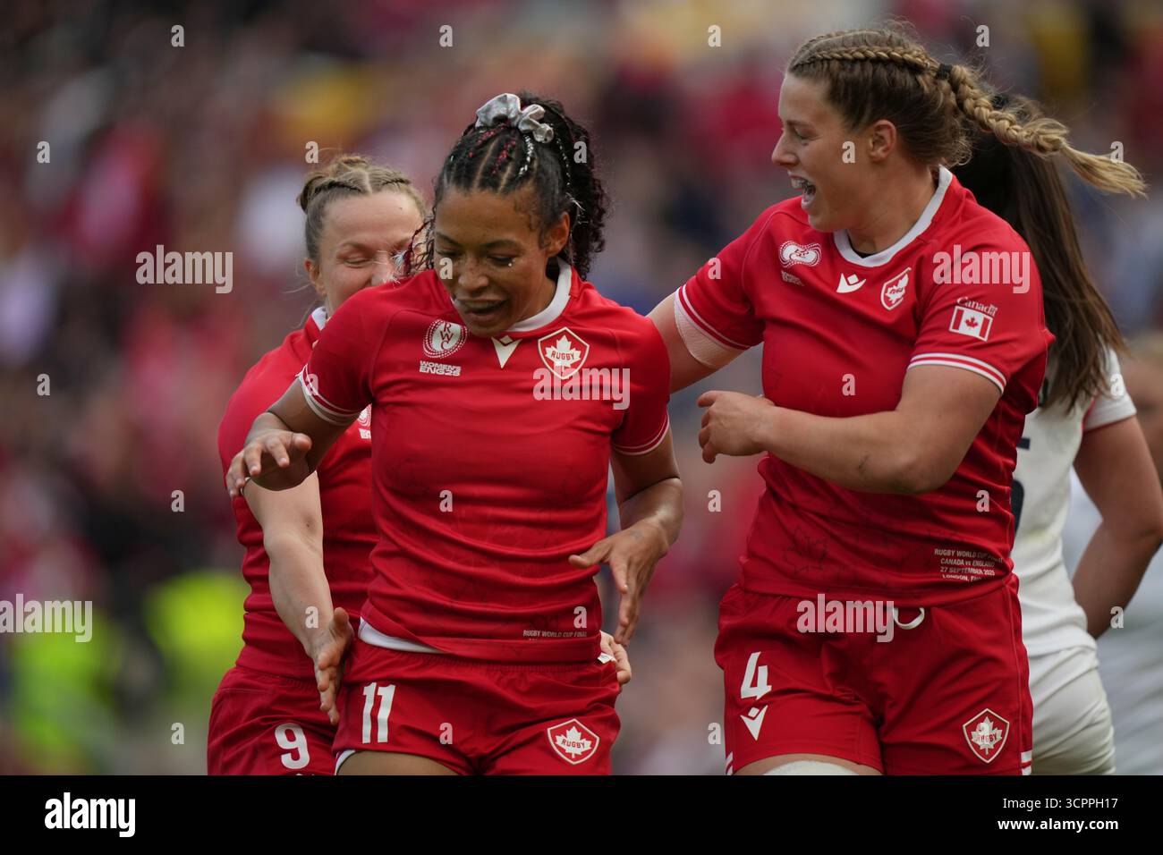 Canada's Asia Hogan-Rochester, left, celebrates with her teammates ...