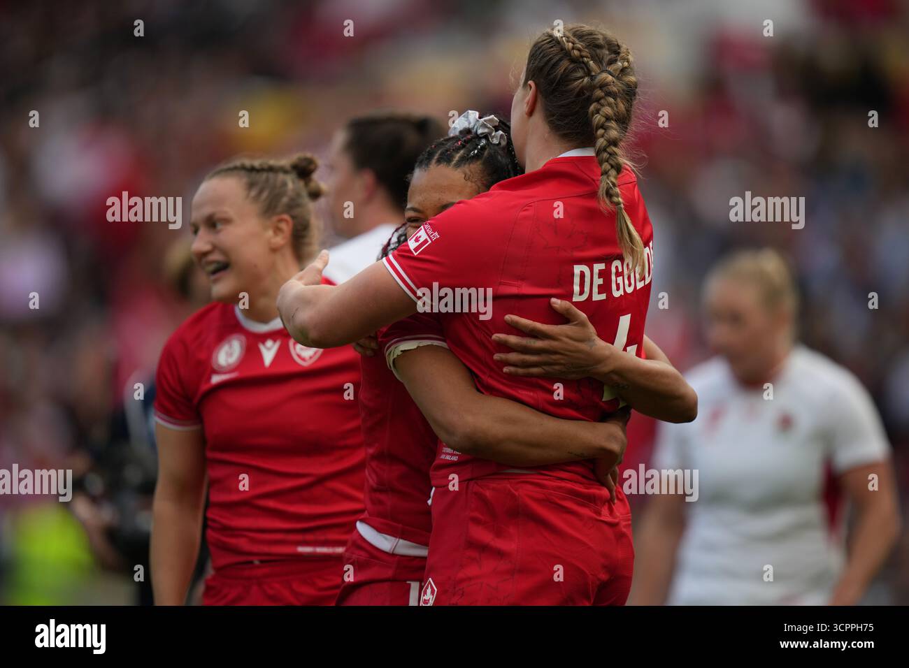 Canada's Asia Hogan-Rochester, second right, celebrates with her ...