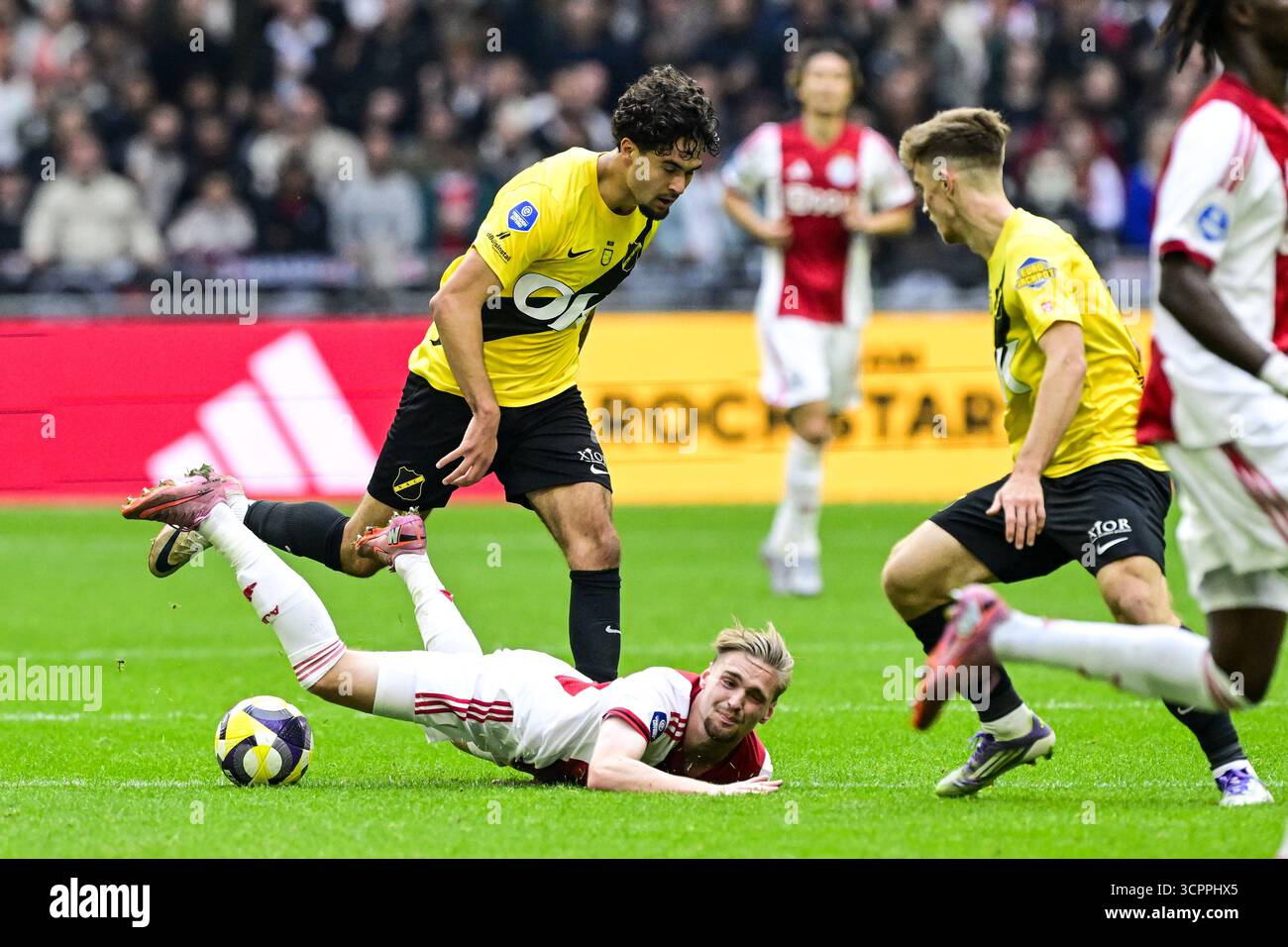 AMSTERDAM - (l-r) Rio Hillen of NAC Breda, Kenneth Taylor of Ajax during the Dutch Eredivisie ...