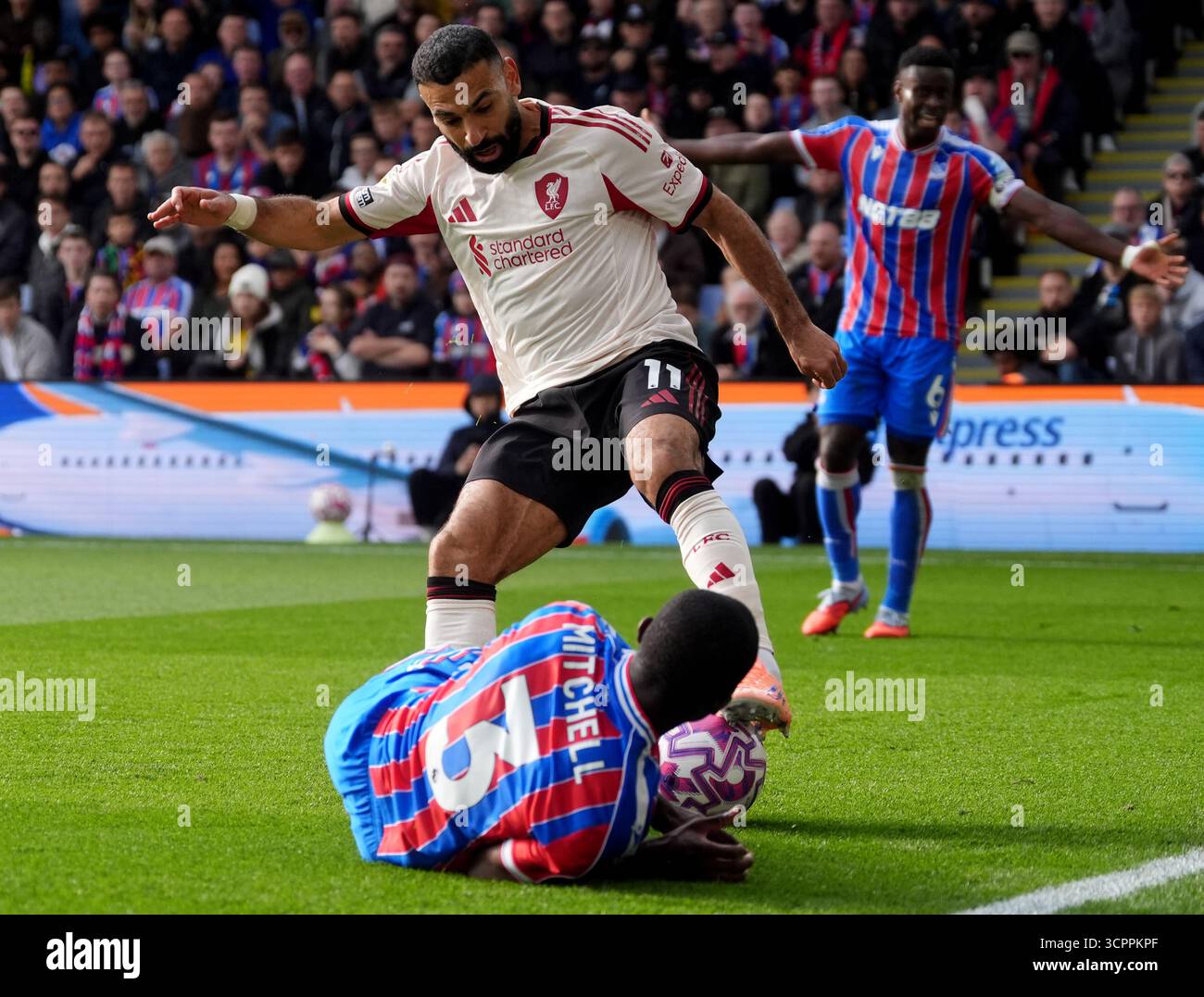 Liverpool's Mohamed Salah and Crystal Palace's Tyrick Mitchell battle ...