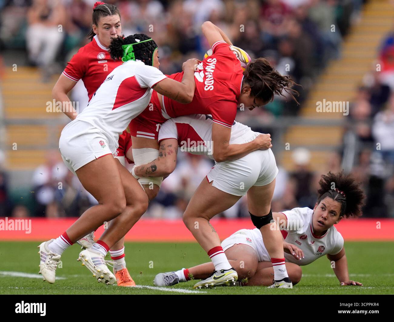Canada's Florence Symonds (centre left) is tackled by England's Sadia ...
