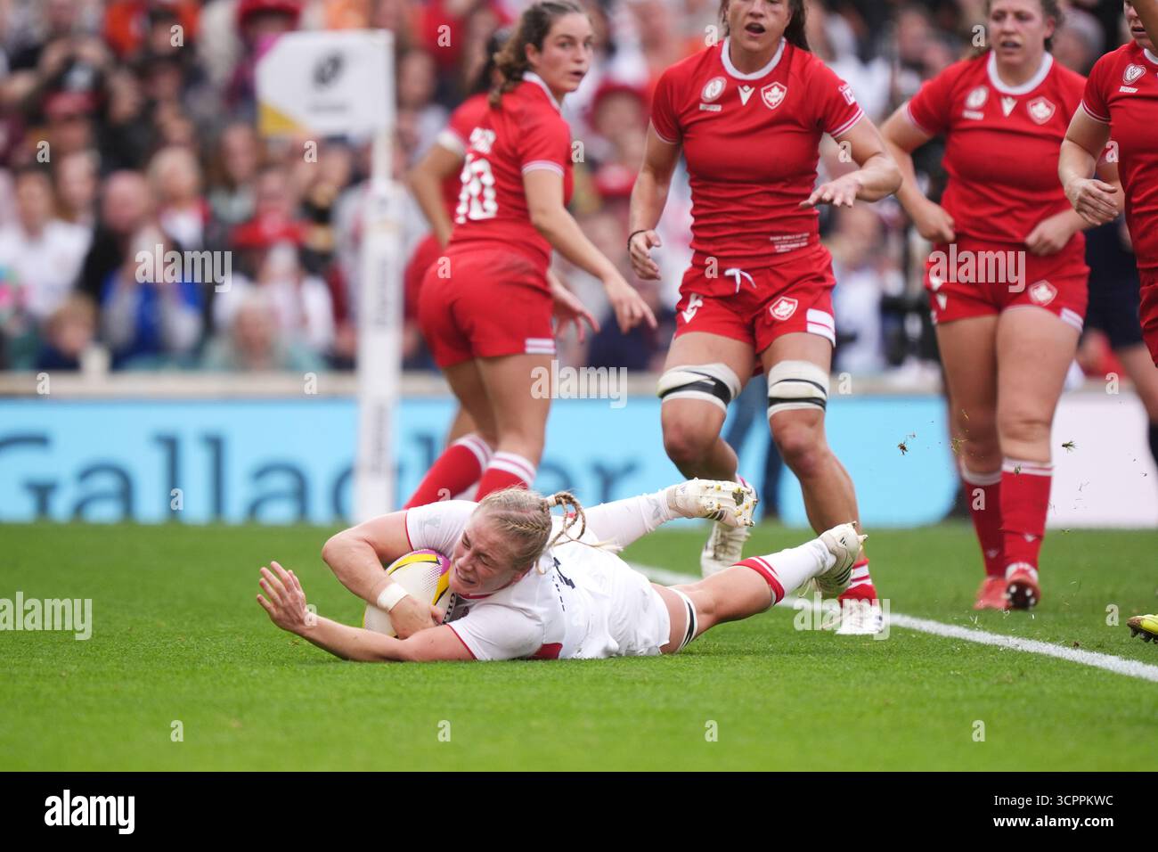 England's Alex Matthews scores a try during the Women's Rugby World Cup ...
