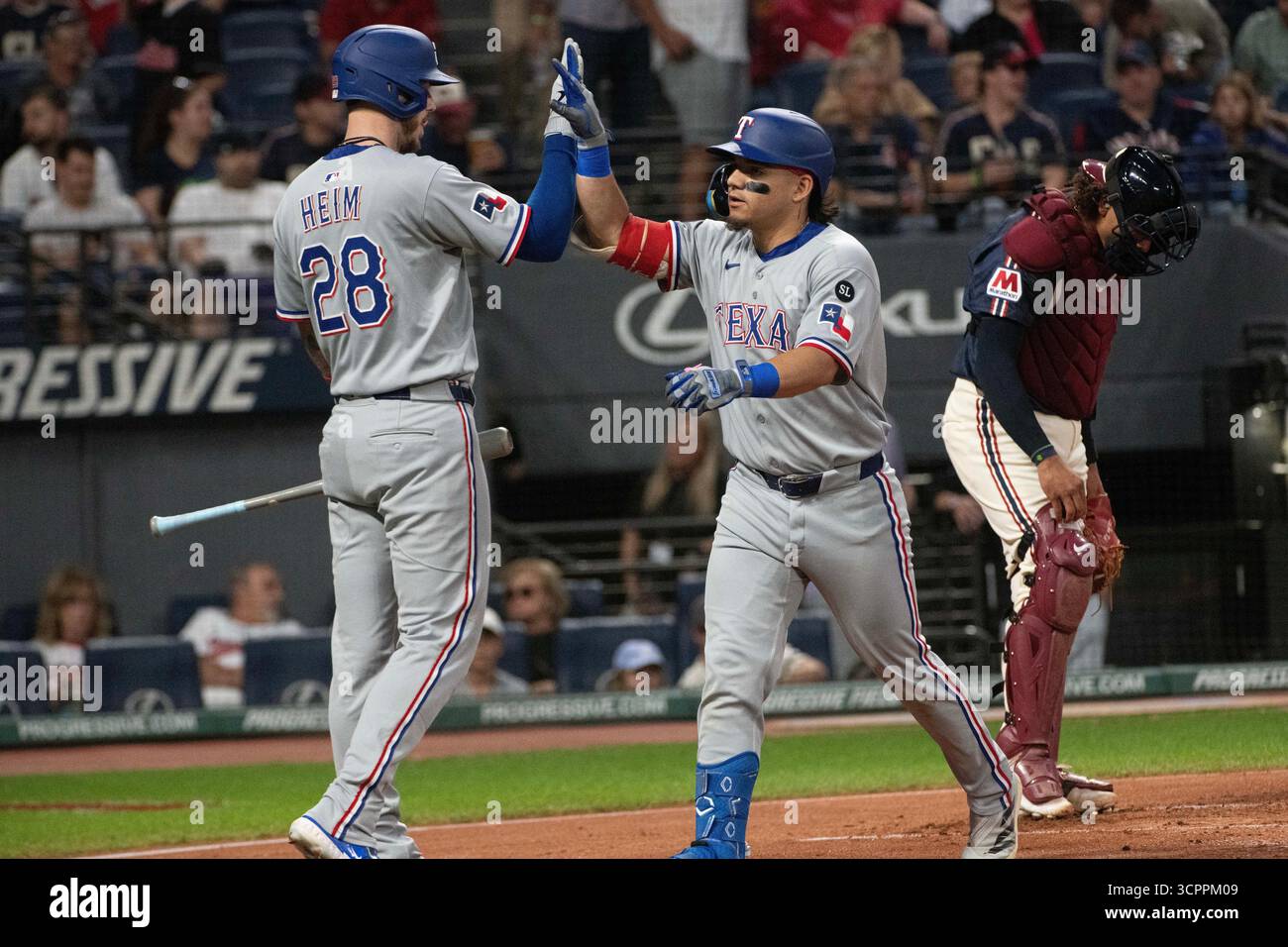 Texas Rangers' Jonah Heim (28) congratulates Alejandro Osuna, center ...