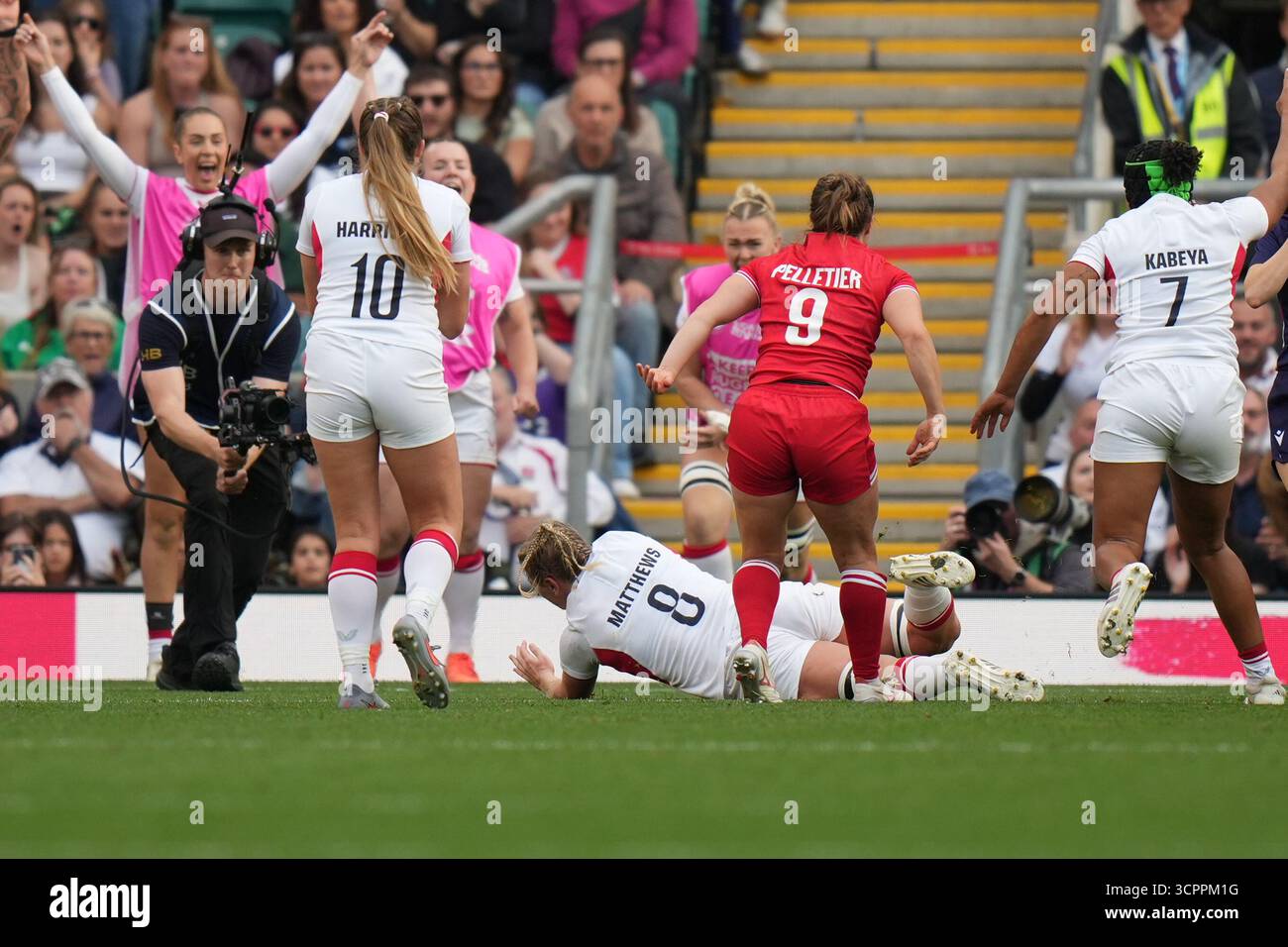 England's Alex Matthews, bottom, scores a try during the Women¥s Rugby ...