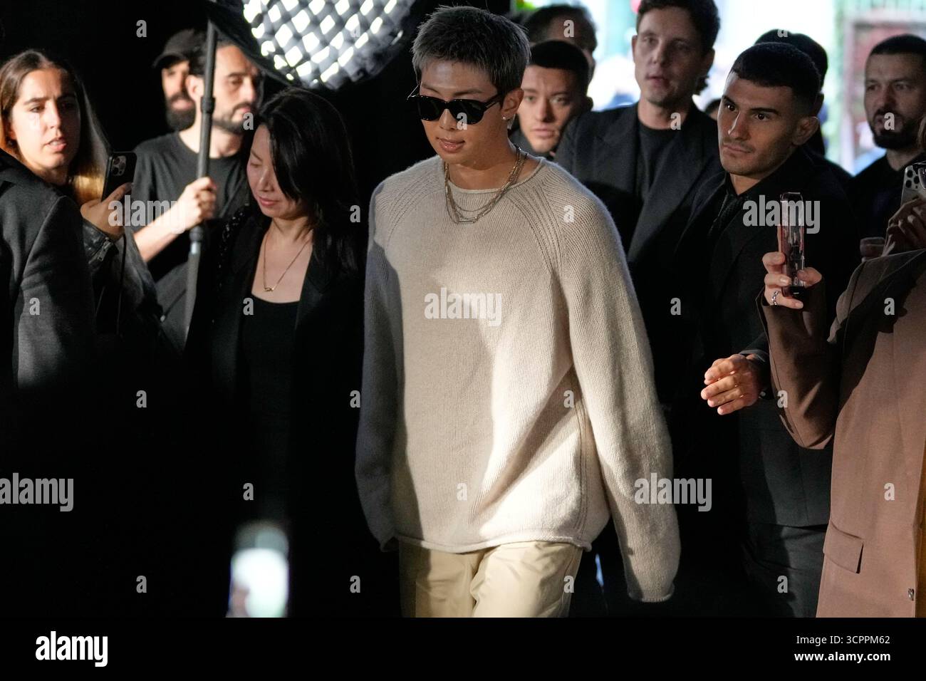 RM of BTS arrives at the Bottega Veneta women's Spring-Summer 2026 fashion show, in Milan, Italy ...