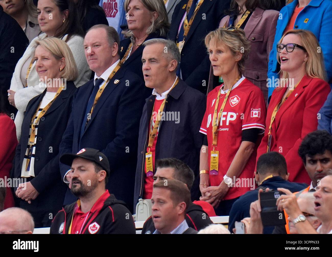 Prime Minister of Canada Mark Carney (centre) and his wife Diana Fox ...
