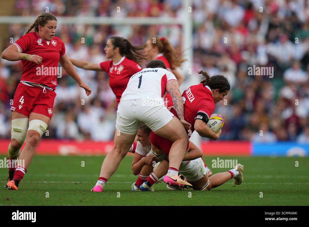 Canada's Fabiola Forteza, right, challenges for the ball with England's ...