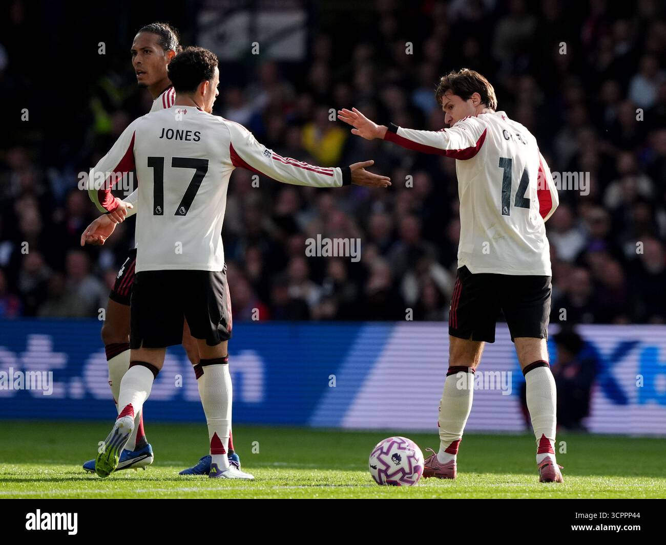 Liverpool's Federico Chiesa (right) celebrates scoring their side's ...