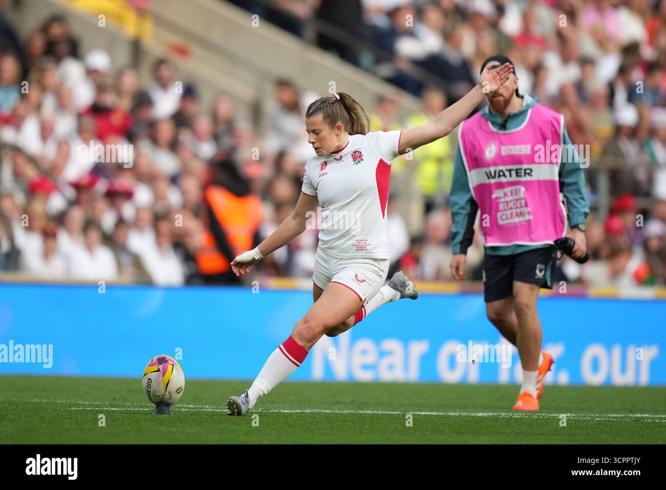 England's Zoe Harrison kicks the ball during the Women's Rugby World ...
