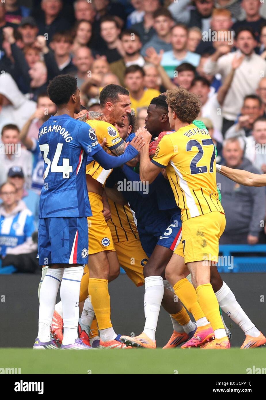 Brighton and Hove Albion's Lewis Dunk (centre left) and Chelsea's ...
