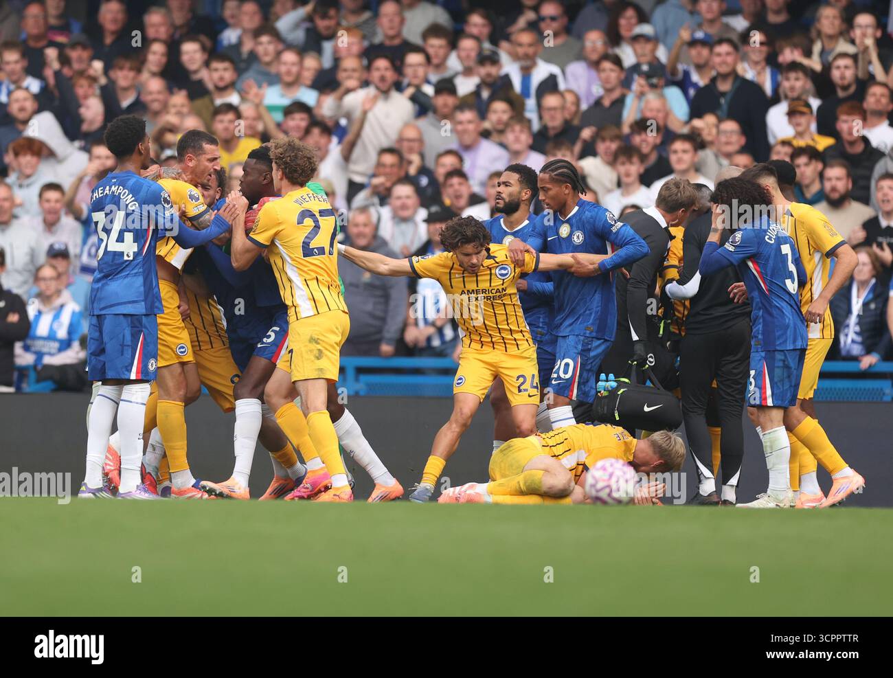 Brighton and Hove Albion's Lewis Dunk (second left) and Chelsea's ...