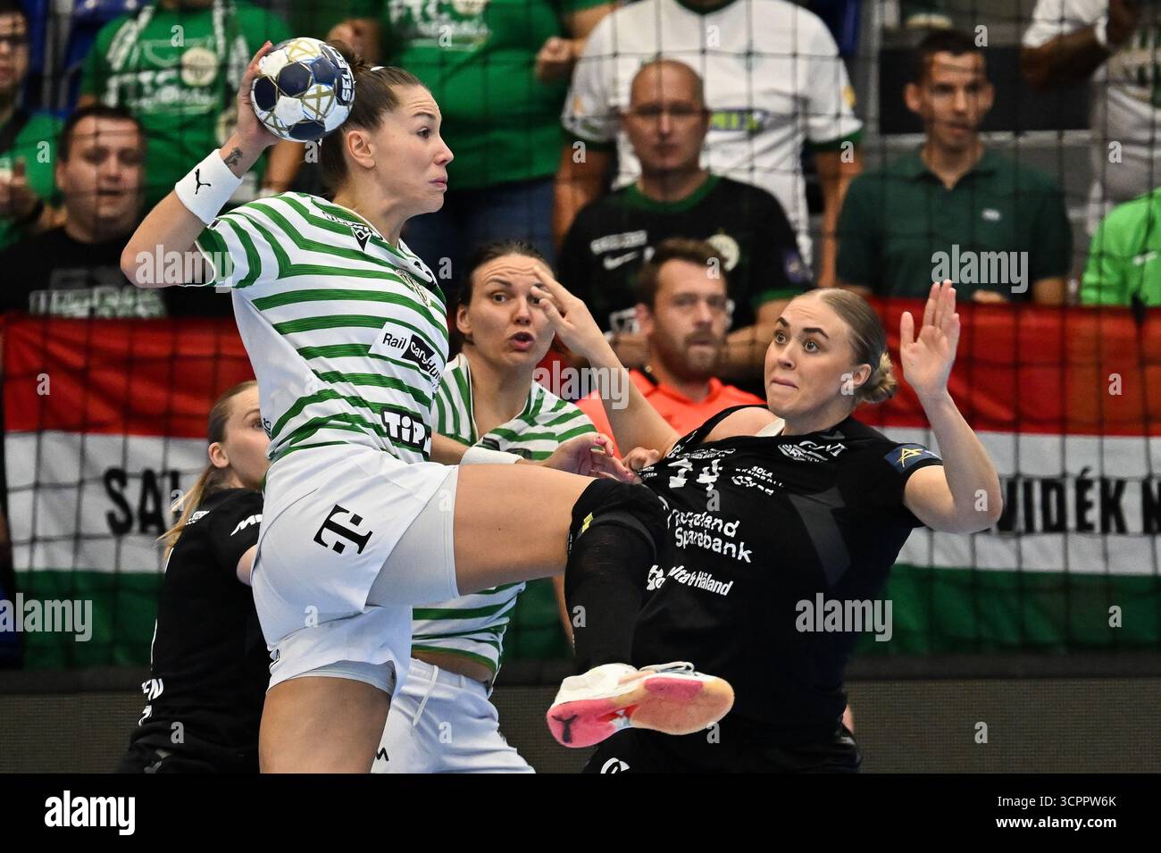 Emily Vogel of Ferencvaros, left, in action against Matha Barka of Sola ...