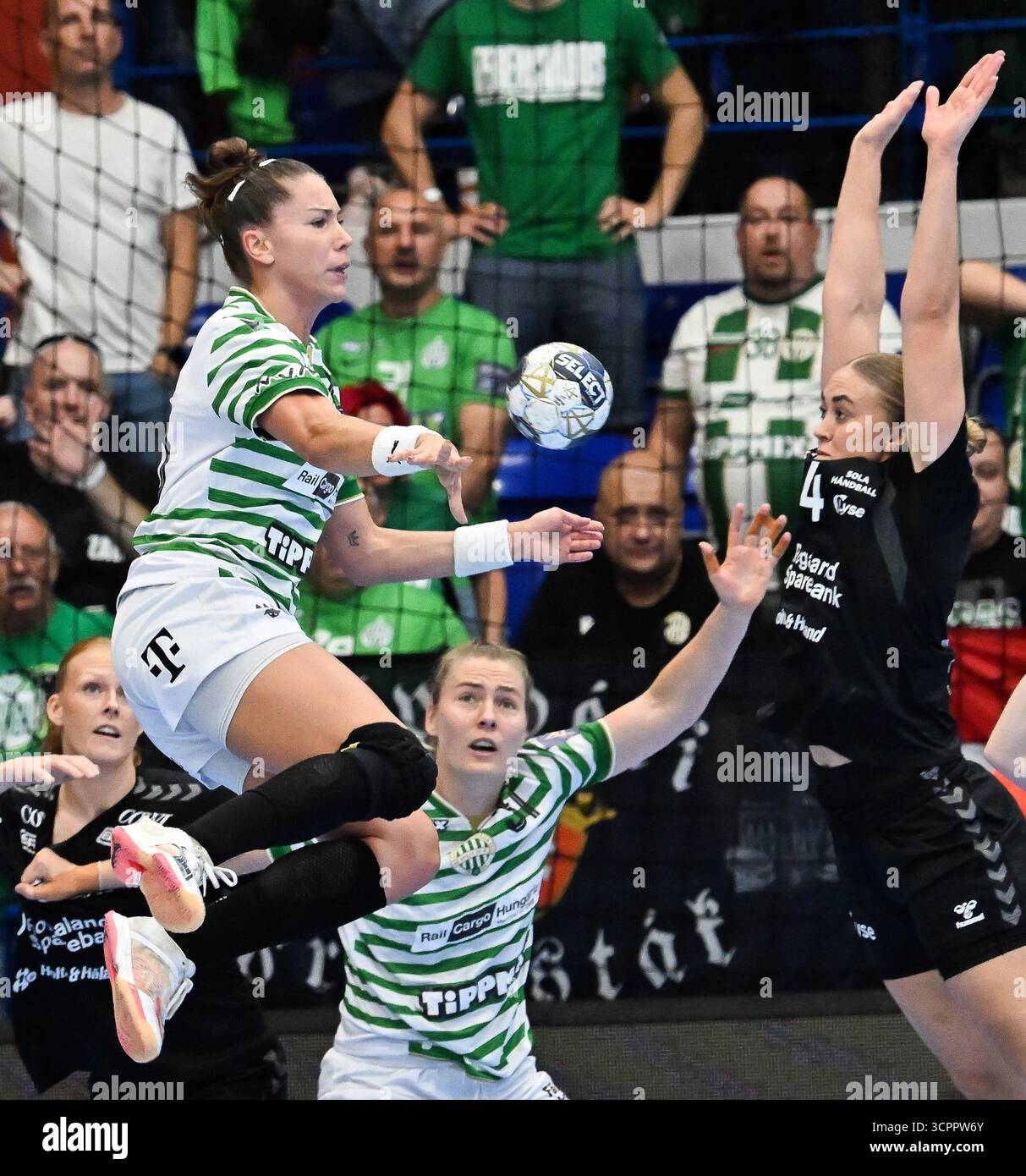 Emily Vogel of Ferencvaros, left, in action against Matha Barka of Sola ...