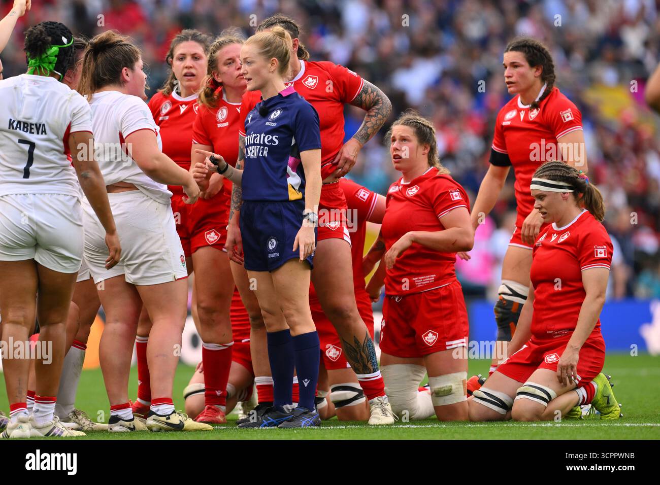 Referee Hollie Davidson speaks to England's Maud Muir during the Women ...
