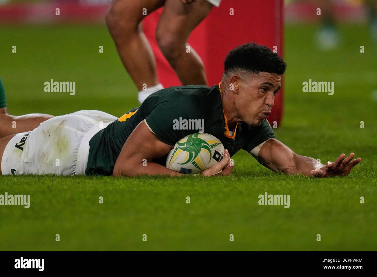 South Africa's Sacha Feinberg-Mngomezulu scores a try during a rugby ...