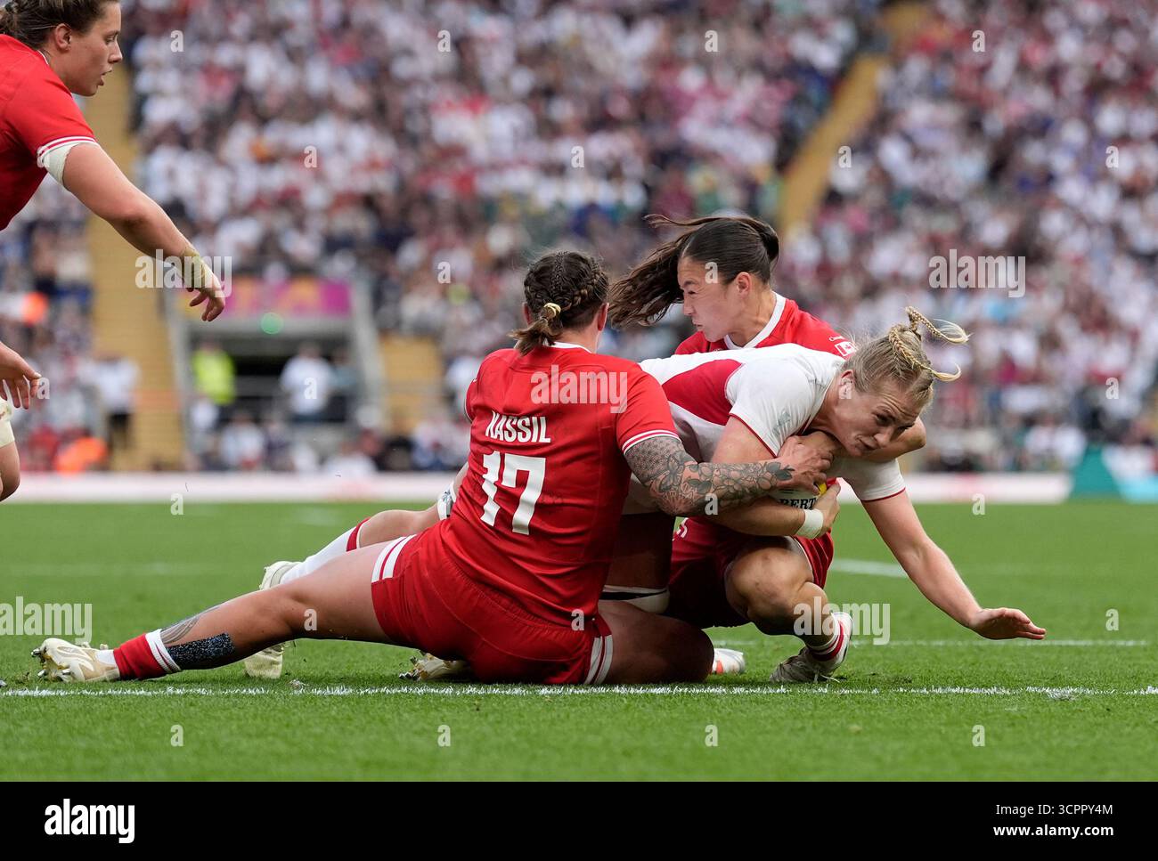 England's Alex Matthews (right) scores a try during the Women's Rugby ...