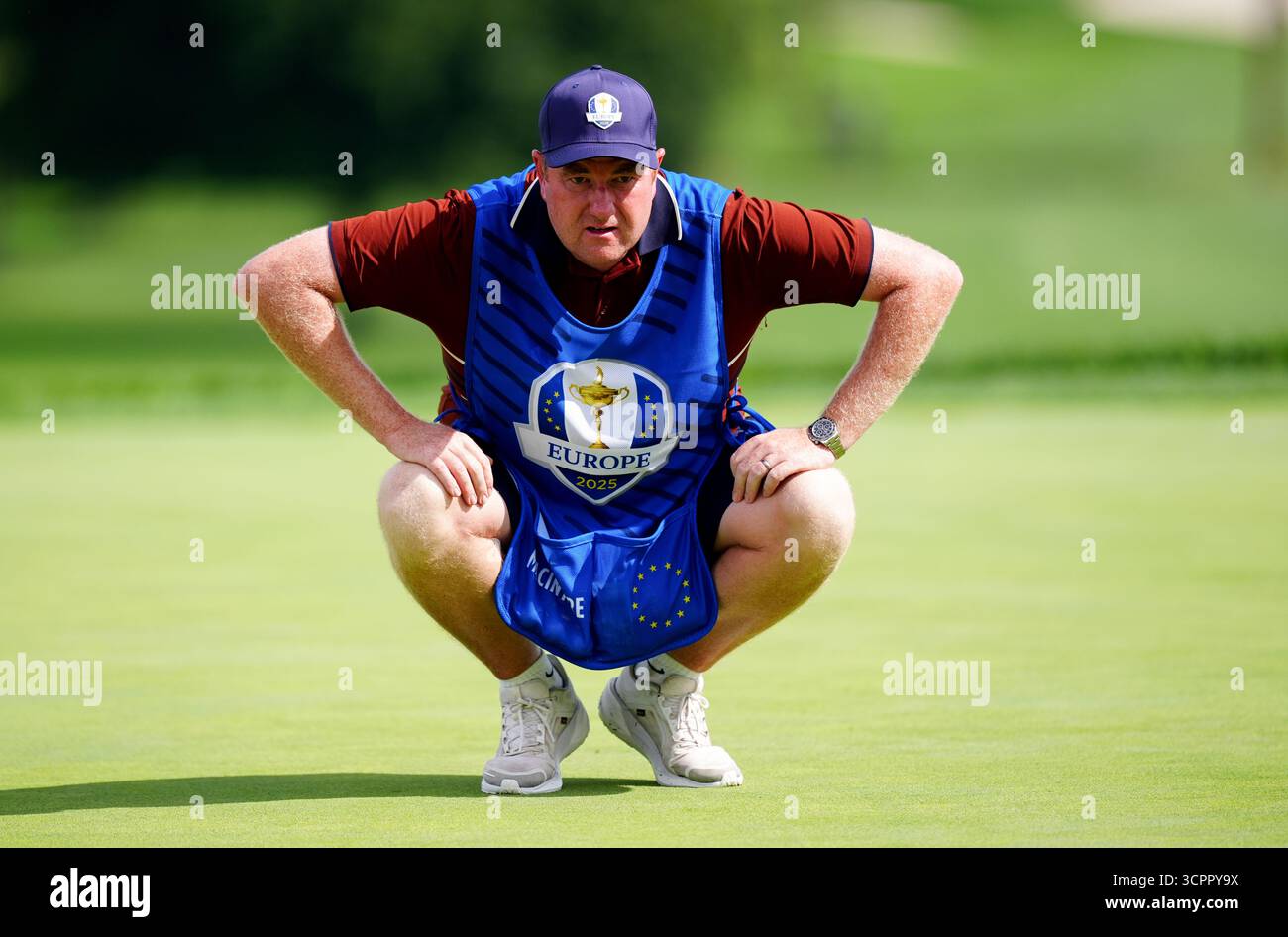 Caddie Mike Burrow during the morning foursomes on day two of the Ryder ...