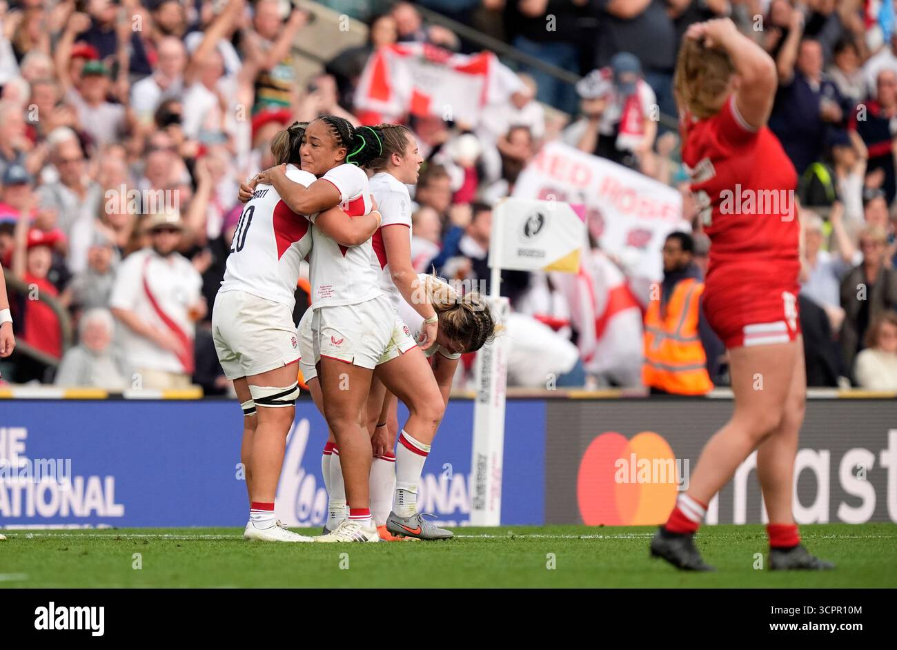 England's Maddie Feaunati (left) and Sadia Kabeya embrace at the final ...