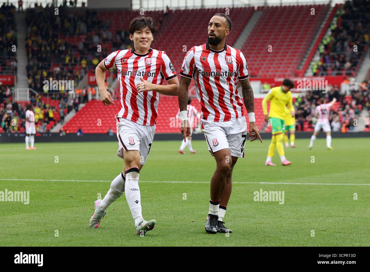 Stoke City’s Sorba Thomas (right) celebrates scoring against with team ...