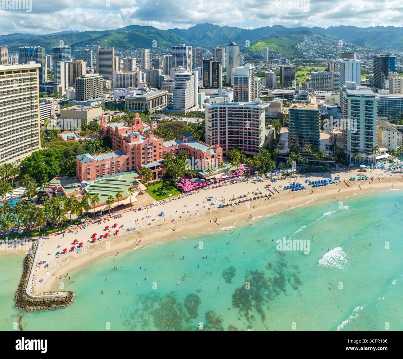 Aerial view of the iconic pink Royal Hawaiian Hotel graces the sandy ...