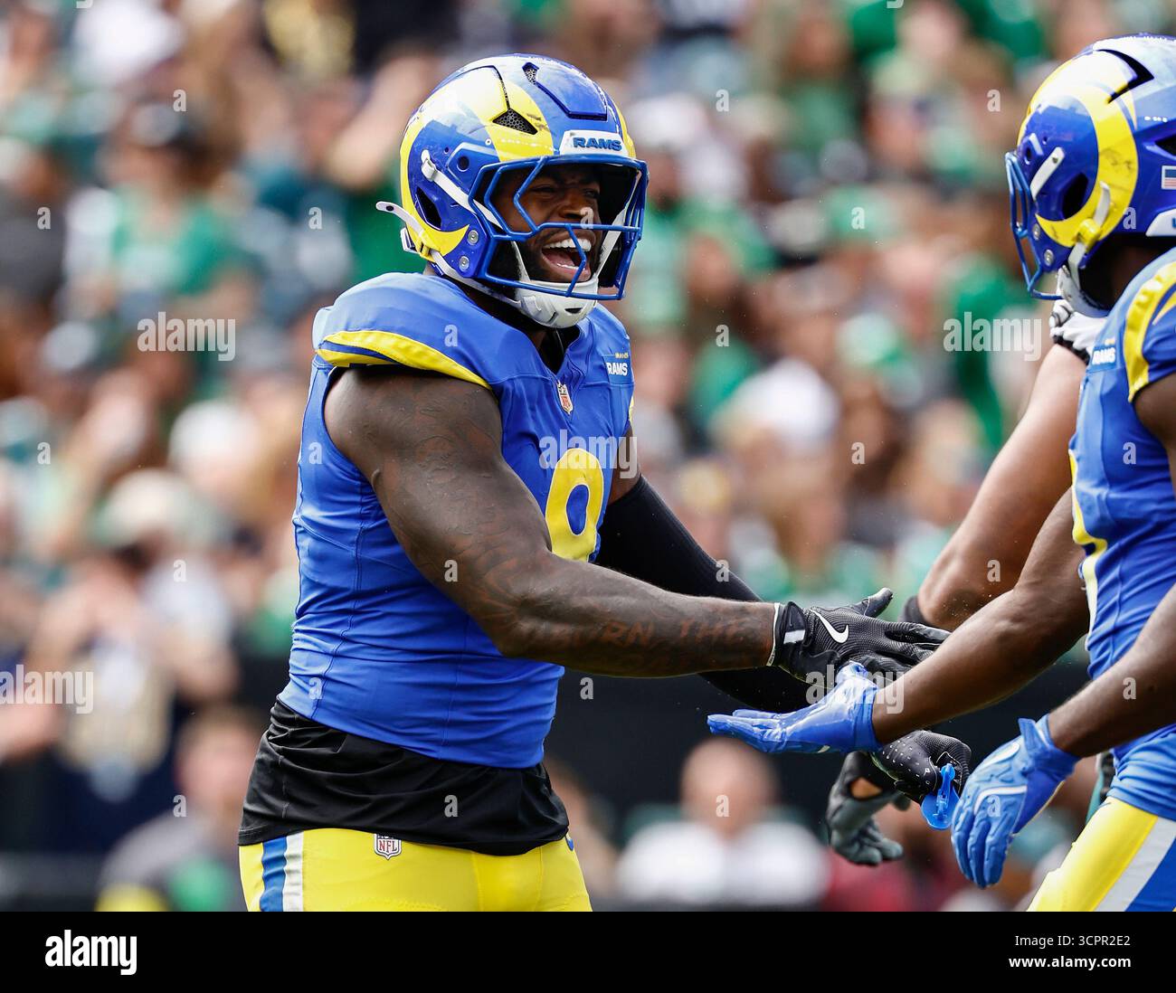 Los Angeles Rams linebacker Jared Verse celebrates a sack against the ...