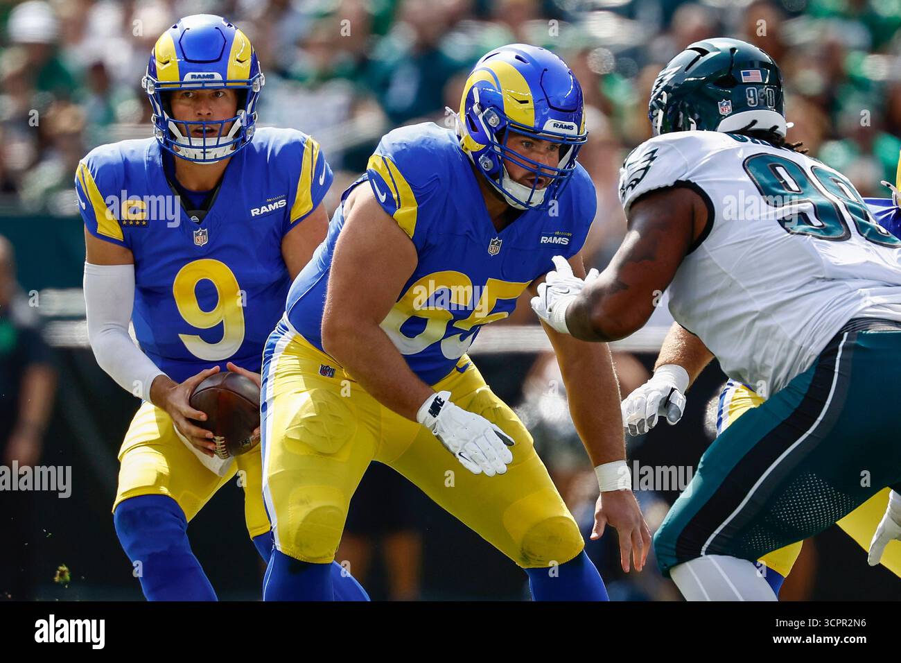 Los Angeles Rams center Coleman Shelton blocks for quarterback Matthew ...