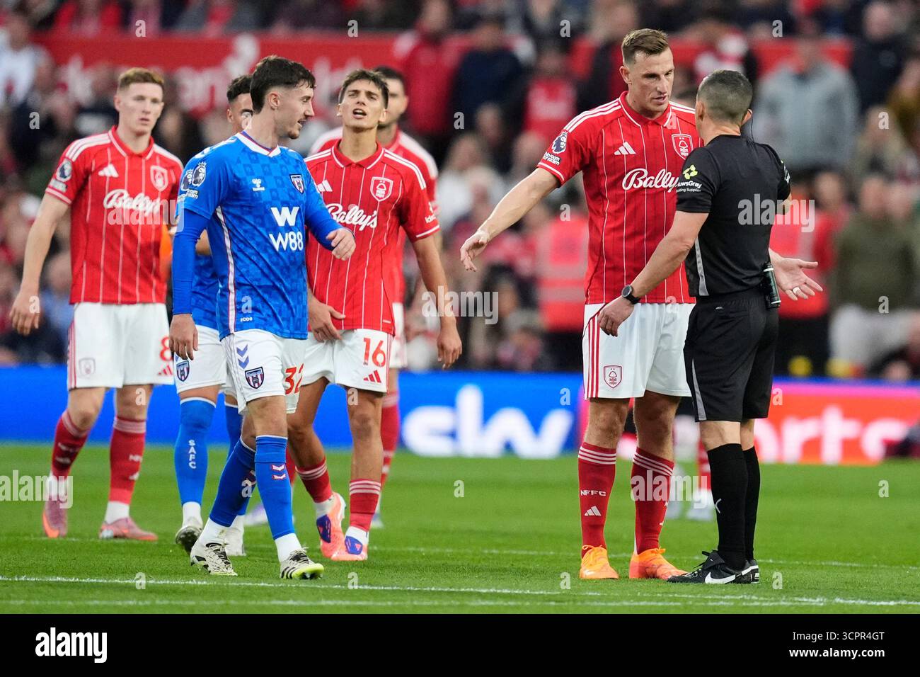 Nottingham Forest's Chris Wood (second from right) complains to referee ...