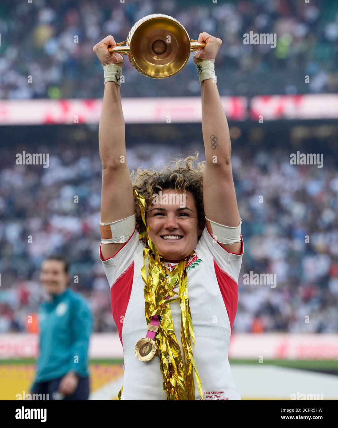 England's Ellie Kildunne lifts the Women's Rugby World trophy after the ...