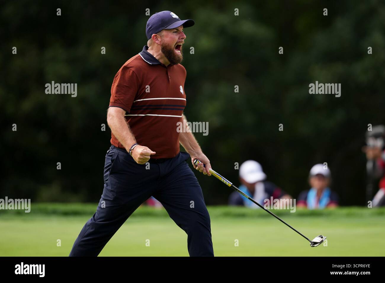 Europe's Shane Lowry celebrates after a putt on the fourth hole at ...