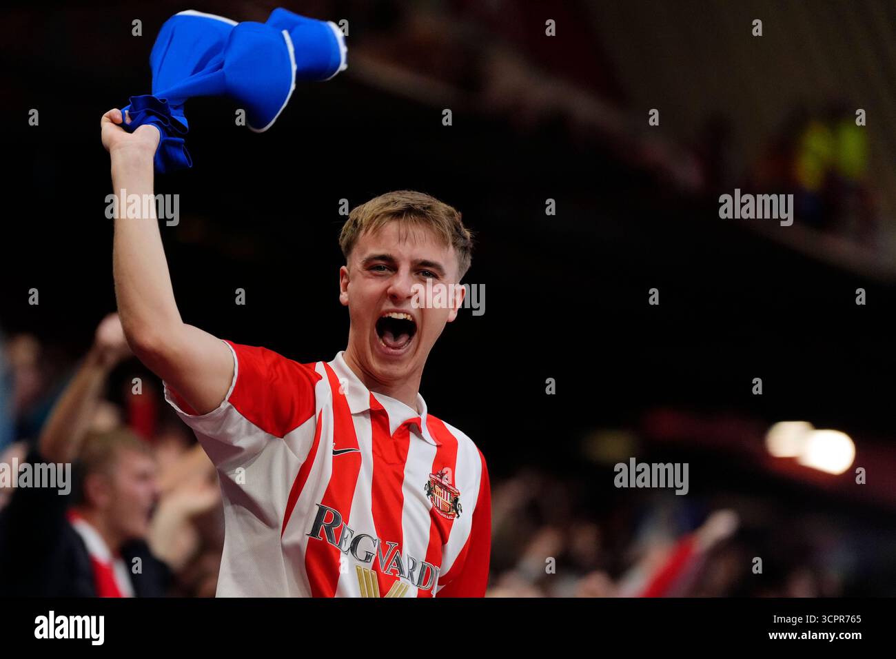 Sunderland fans celebrate in the crowd during the Premier League match ...