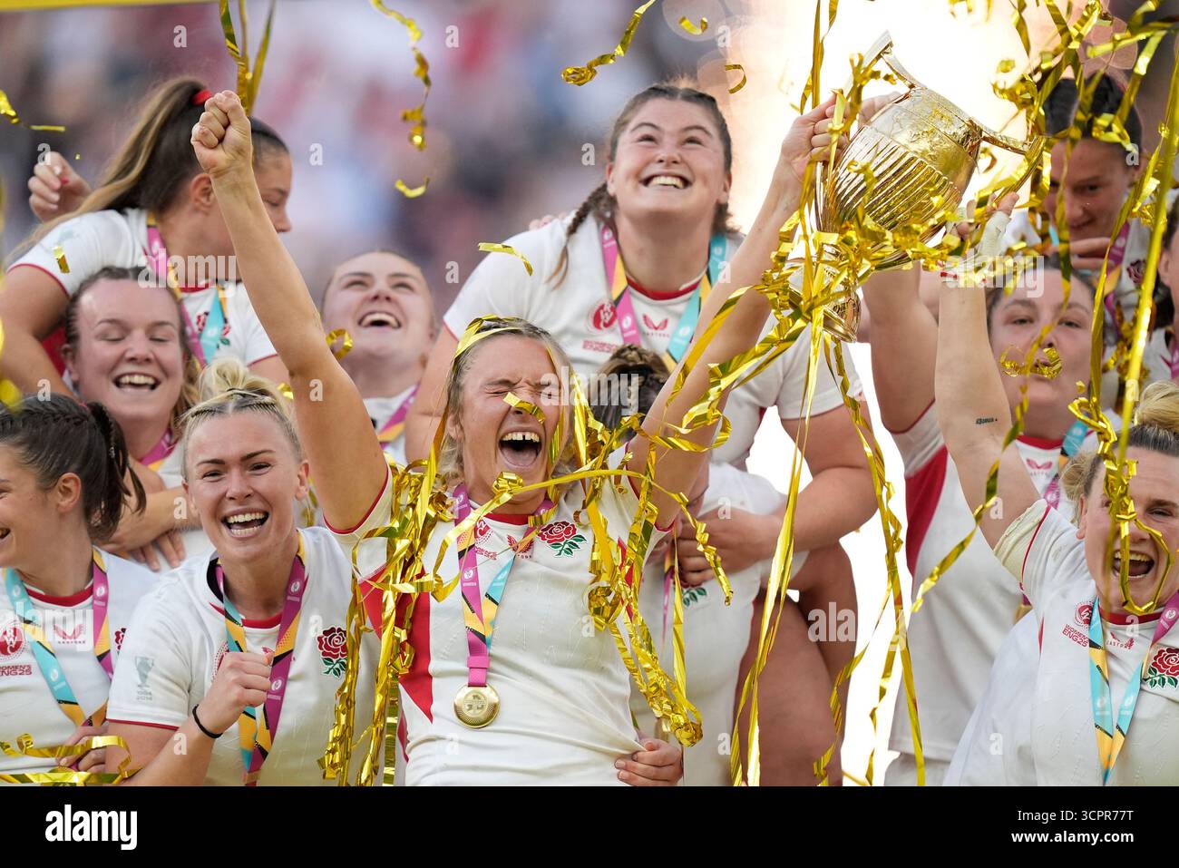 England's players celebrate as Zoe Aldcroft lifts the Women's Rugby ...