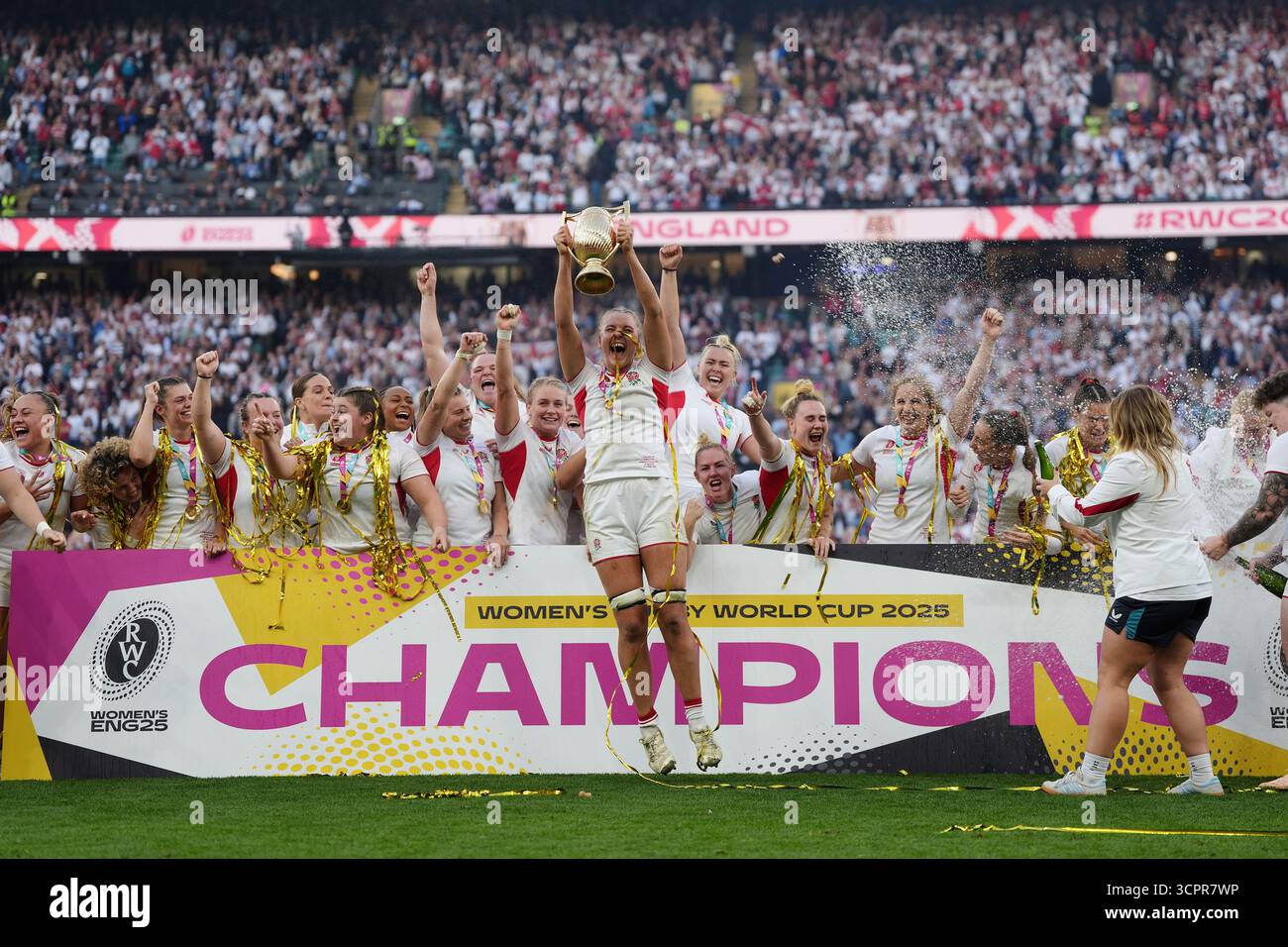 England's Zoe Aldcroft lifts the trophy as she celebrates with team ...
