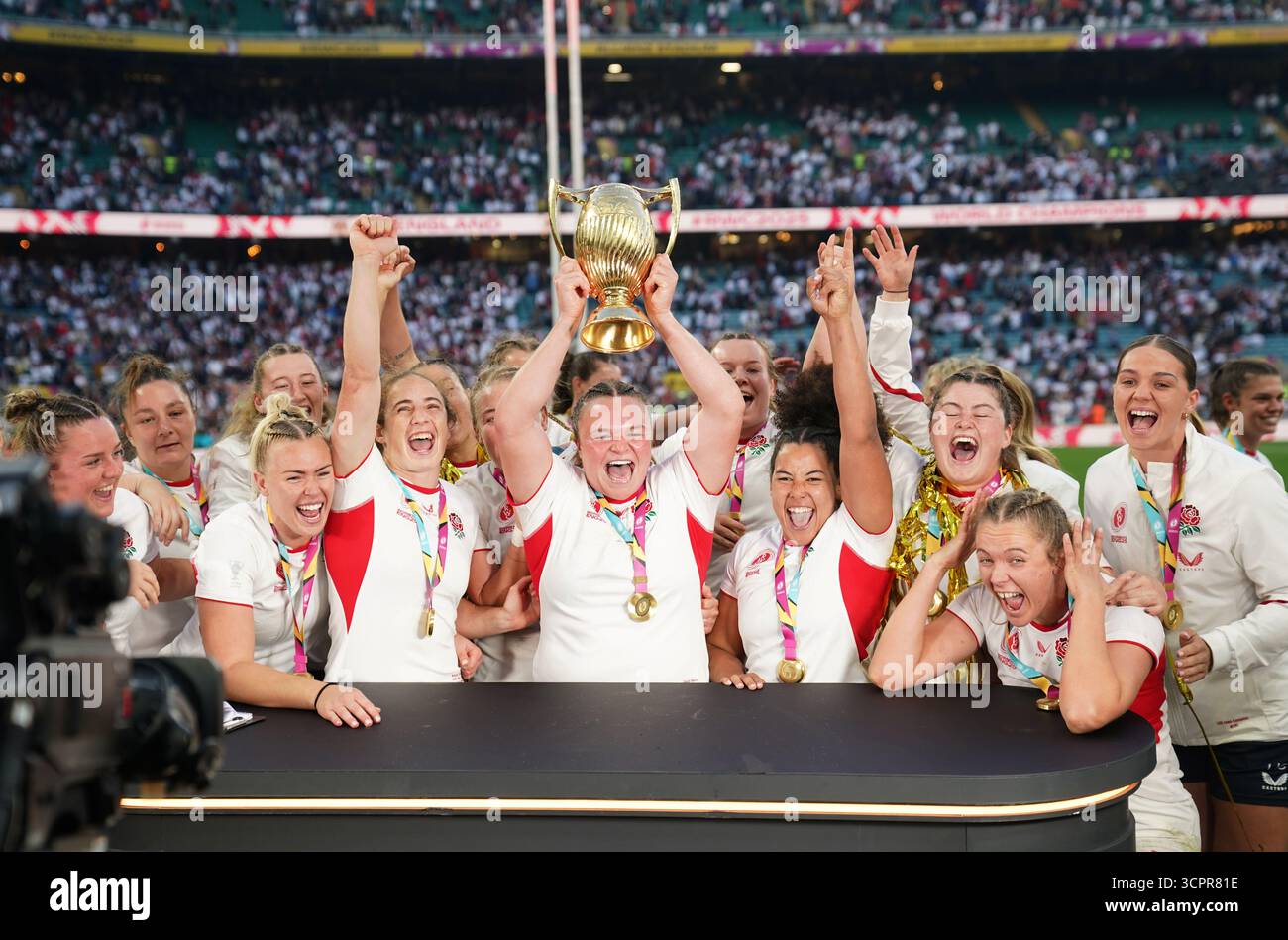 England's Sarah Bern lifts the trophy at the BBC pitch side studio as ...