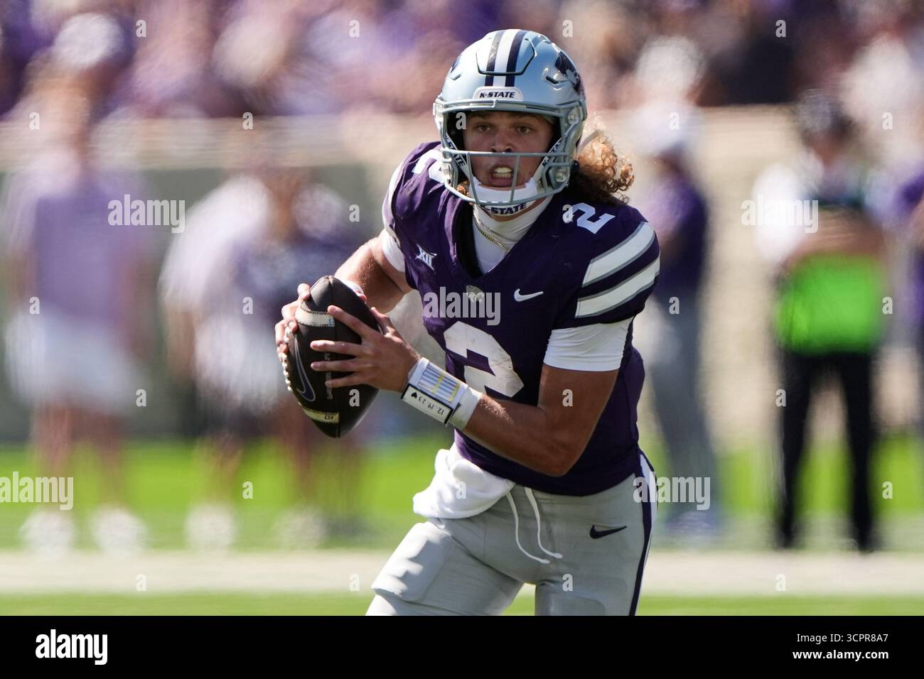 Kansas State quarterback Avery Johnson looks to pass during the first ...