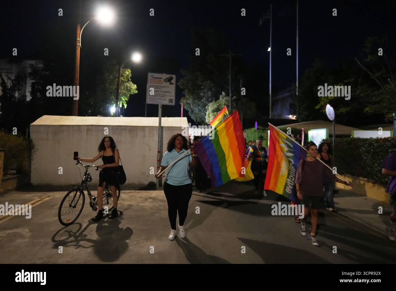 Greek Cypriot and Turkish Cypriot LGBTQ groups take part in a Pride ...