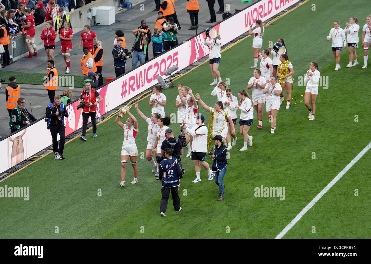 England's Zoe Aldcroft lifts the Women's Rugby World trophy as they ...