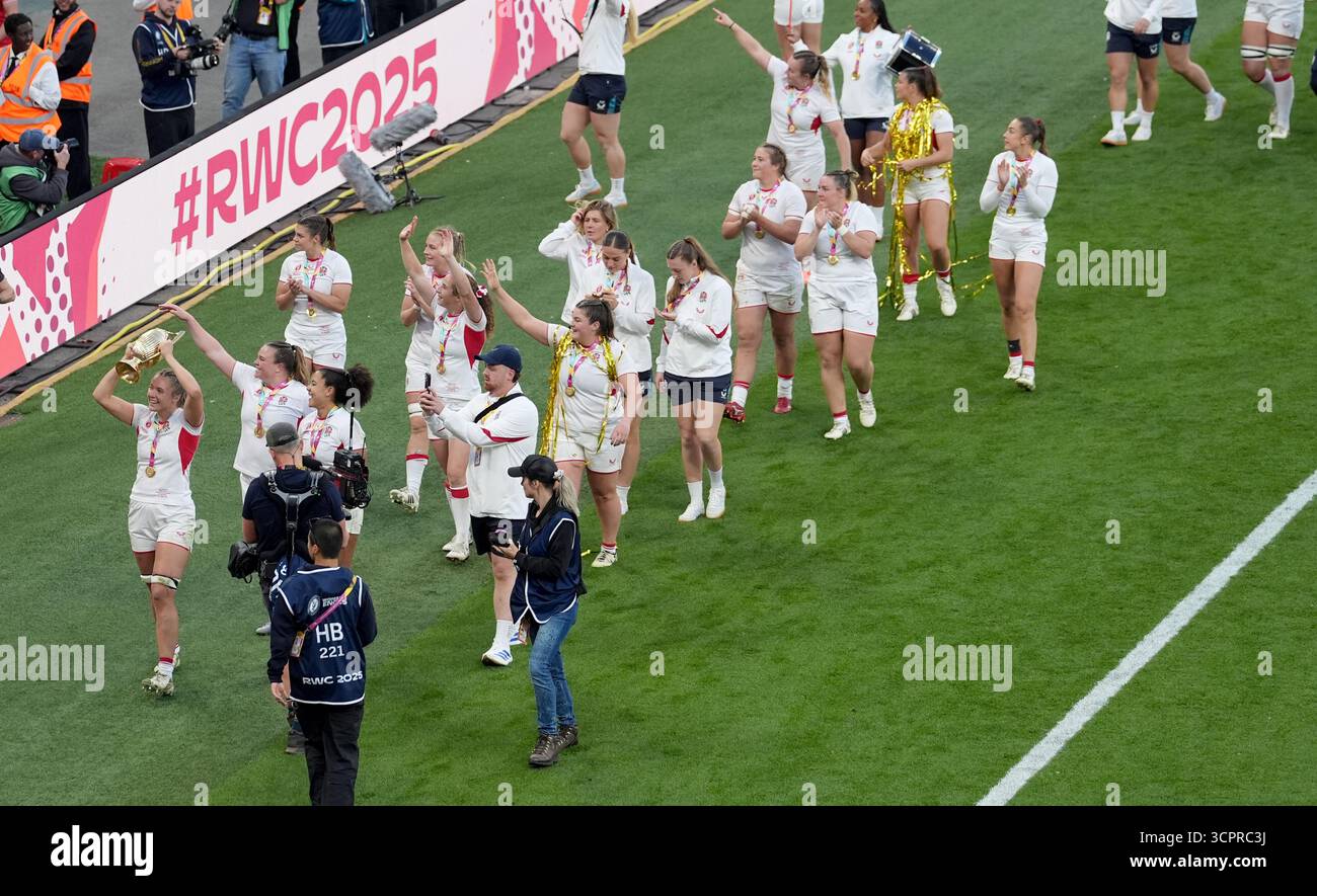 England's Zoe Aldcroft lifts the Women's Rugby World trophy as they ...