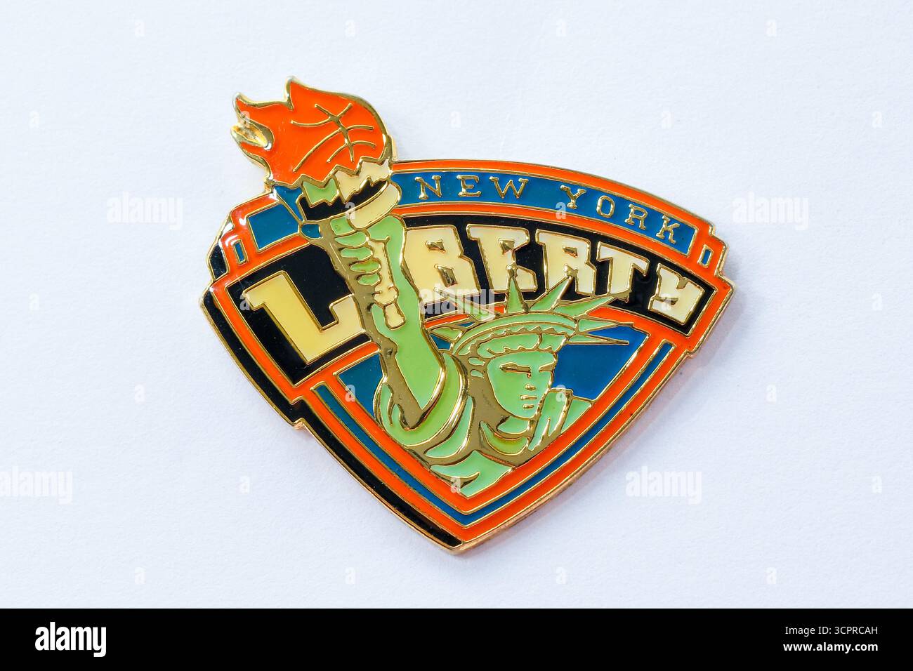 A detail view of a lapel pin of the New York Liberty logo circa 1998 ...