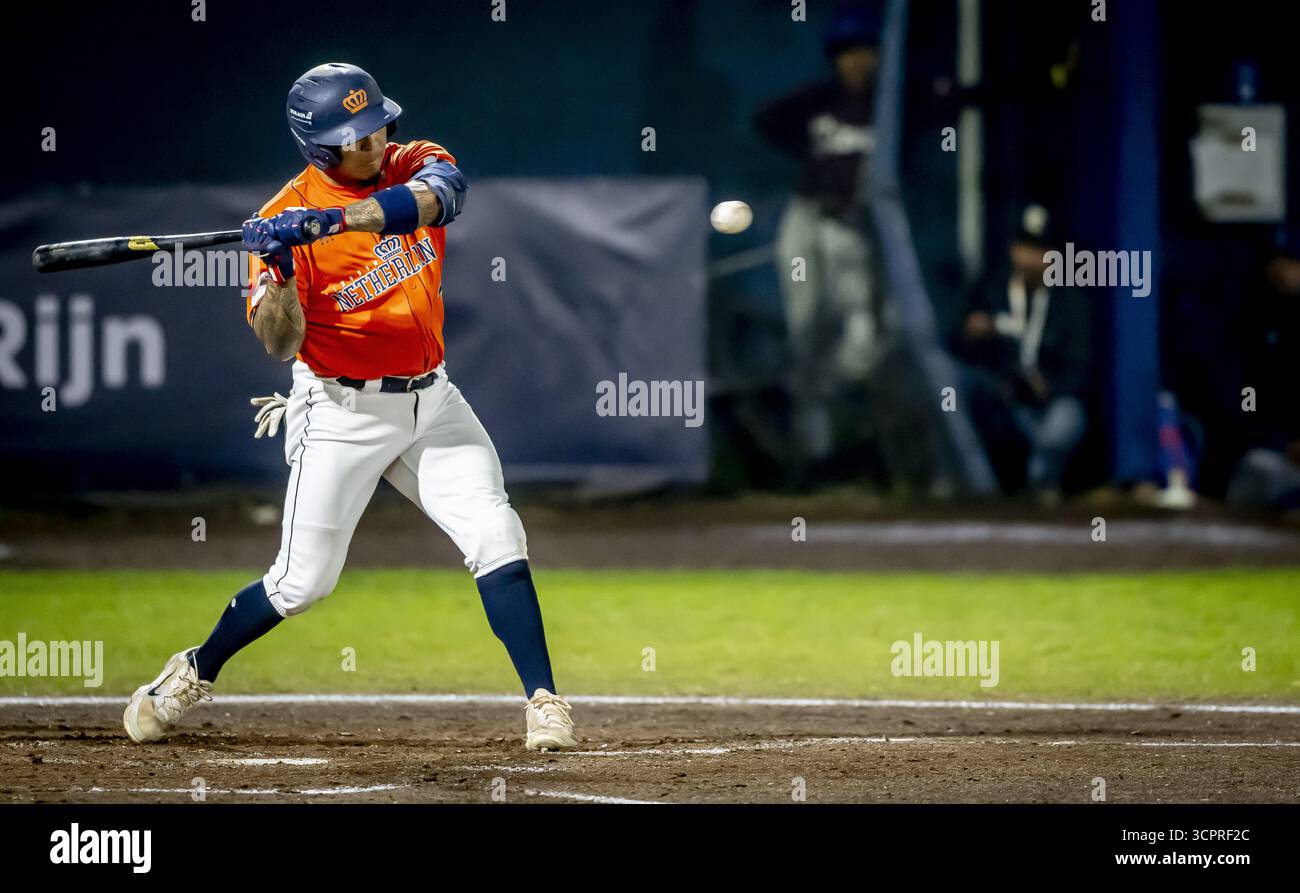 ROTTERDAM - Dutch baseball player TROMP Jiandido in action against ...