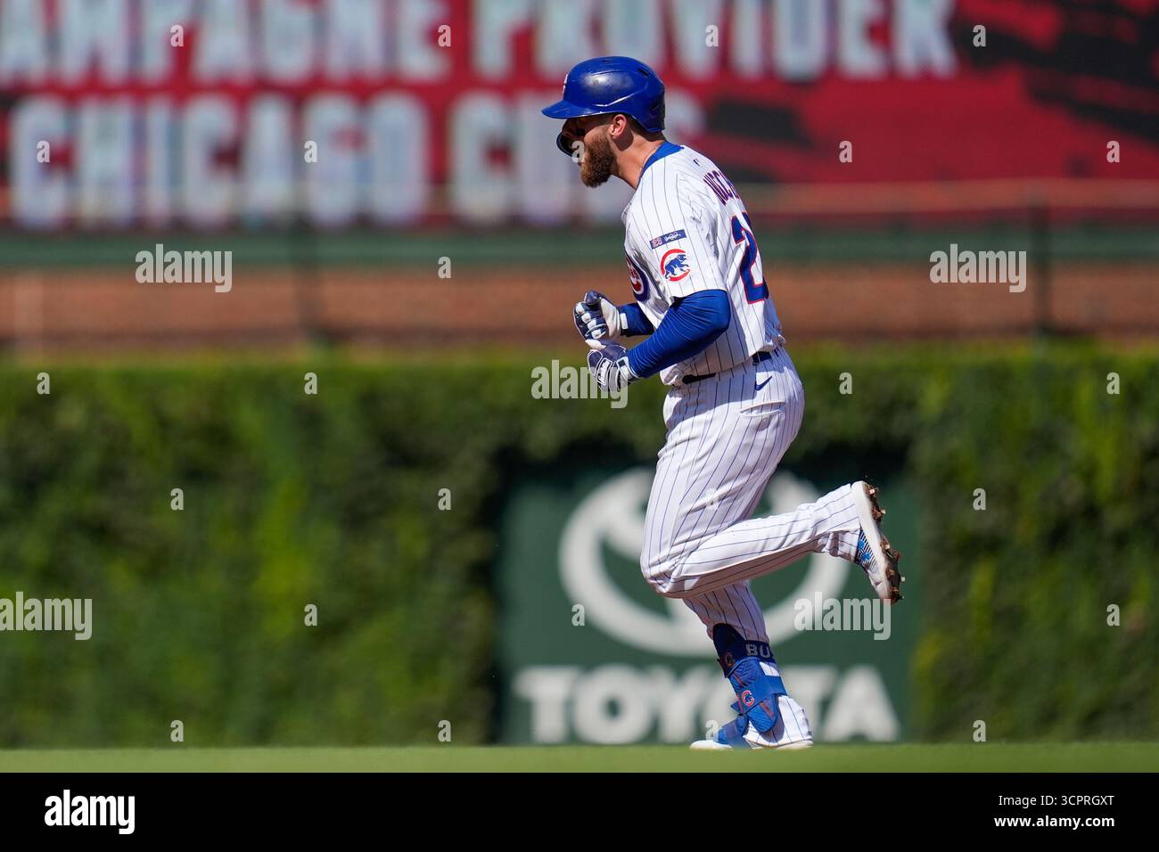 Chicago Cubs' Michael Busch (29) runs the bases after hitting a home ...